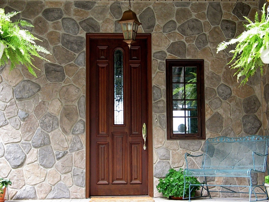 Create a Presidential Entryway with Vertical Concrete Faux Stone Siding ...